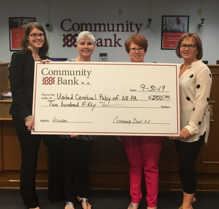 Community Bank, N.A. Makes Donation to UCP for 'Good Neighbor Day'
